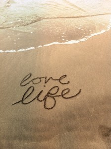 Fun activities: beach calligraphy or drawing in sand!