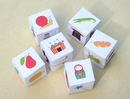 Storytelling dice game with 35 images to make up stories • Happythought