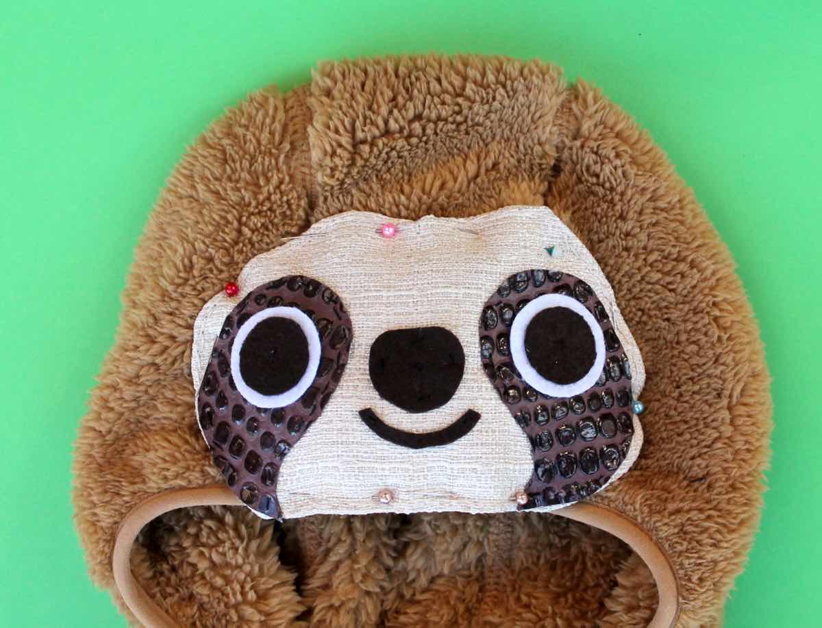 Make your own DIY sloth hoody with added claws. Get crafty • Happythought